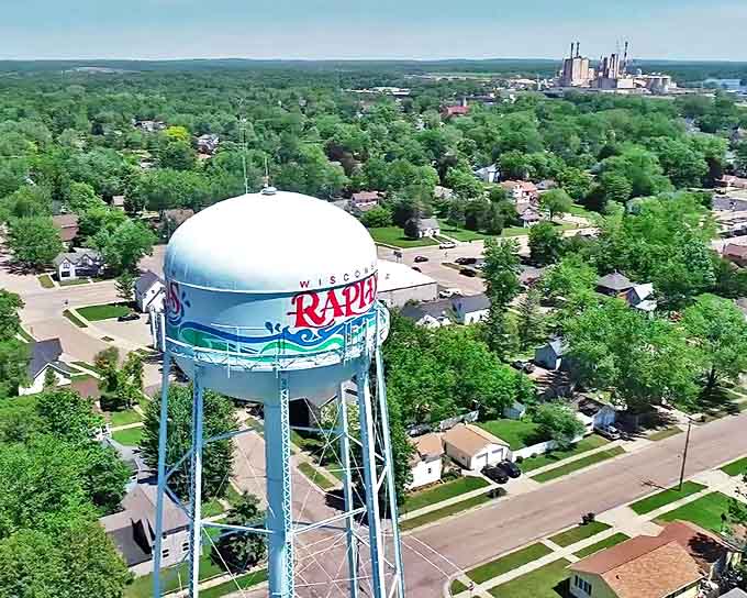 That iconic water tower stands like a beacon of small-town pride, welcoming visitors to Wisconsin Rapids with unmistakable charm and character.