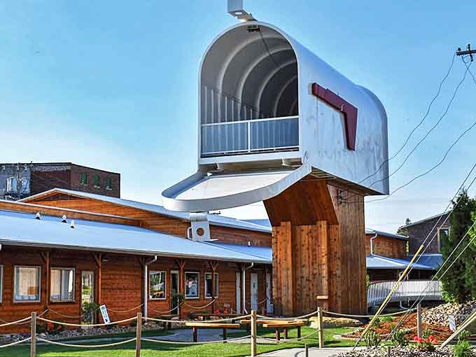 A postal palace fit for giants! Casey's record-breaking mailbox stands proudly against the Illinois sky, making ordinary mail delivery seem positively miniature.
