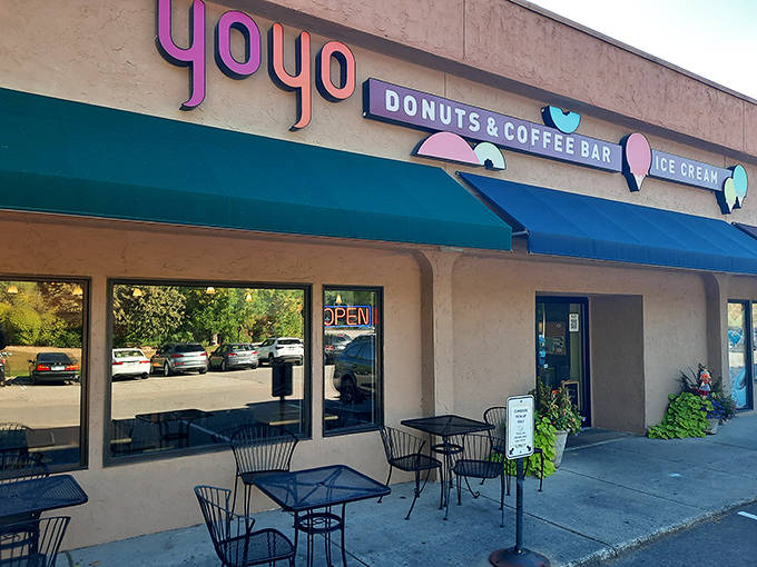 YoYo Donuts welcomes sugar enthusiasts with its cheerful storefront in Minnetonka, where the vibrant signage promises sweet adventures within.