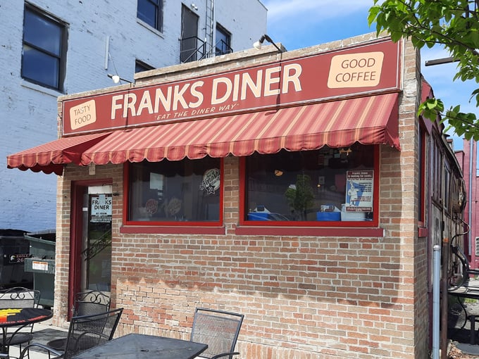 Frank's Diner welcomes you with its iconic red awning and promises of "Tasty Food" and "Good Coffee" &ndash; spoiler alert: they deliver on both!