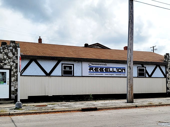 The unassuming exterior of Cheesesteak Rebellion hides a galaxy of flavors within its walls, proving great things come in modest packages.