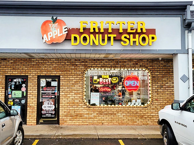 The iconic brick facade of Apple Fritter Donut Shop stands proudly in Ferndale, its yellow sign a beacon for donut lovers seeking sugary salvation.