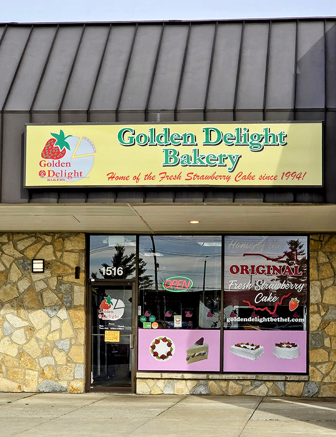 The unassuming exterior of Golden Delight Bakery belies the sweet treasures within. That yellow sign is like a beacon for dessert lovers throughout Ohio.