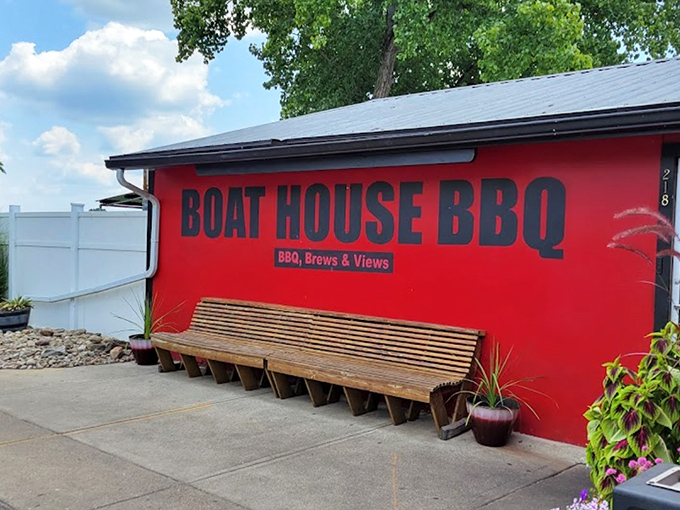 The vibrant red exterior of Boat House BBQ promises smoky delights within &ndash; like finding a ruby in Ohio's riverside crown.