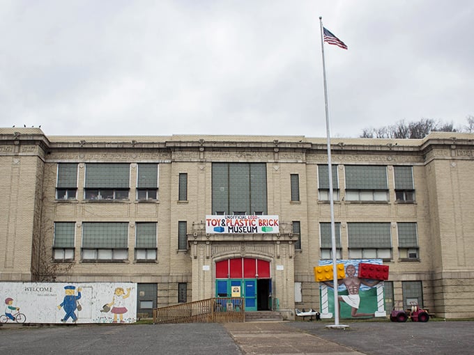 The unassuming exterior of brick paradise &ndash; where an old school building houses colorful dreams and countless hours of meticulous assembly.