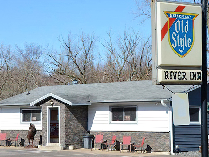 The unassuming exterior of River Inn, where culinary magic happens behind that modest Old Style sign and stone facade.