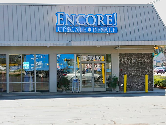 The welcoming blue storefront of Encore! Upscale Resale stands like a fashion oasis in Southfield, promising treasures within its unassuming exterior.
