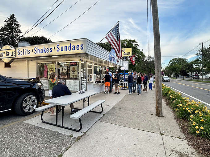 The white building with its blue stripe and American flag isn't just serving ice cream &ndash; it's dishing out nostalgia by the scoopful.