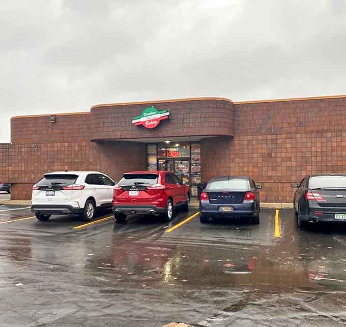 The unassuming brick exterior of Dearborn Italian Bakery hides a world of culinary treasures within, like finding Italy tucked away in suburban Michigan.