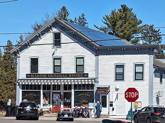 The classic white clapboard exterior of Marine General Store stands proudly on Judd Street, a timeless beacon of small-town charm and culinary treasures.