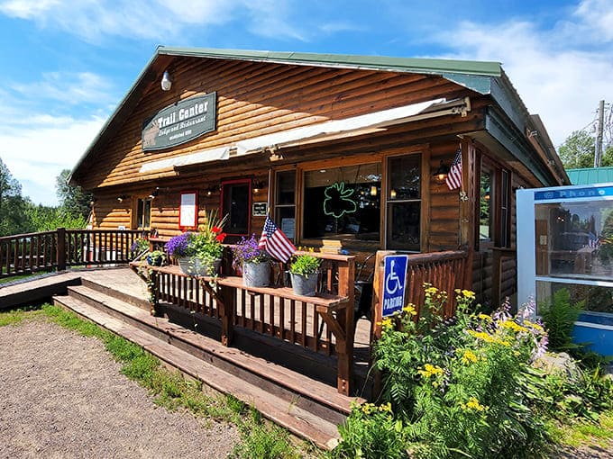 The Trail Center Lodge welcomes hungry adventurers with its rustic wooden charm and flower-filled porch &ndash; a North Woods postcard come to life.