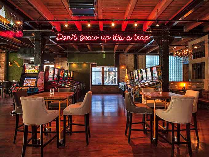 The iconic Headquarters Beercade sign glows like a beacon for grown-ups seeking permission to play again in Chicago's vibrant River North district.