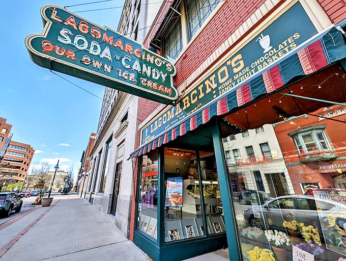 The iconic green and red neon sign beckons sweet-toothed pilgrims like a lighthouse of deliciousness in downtown Moline.