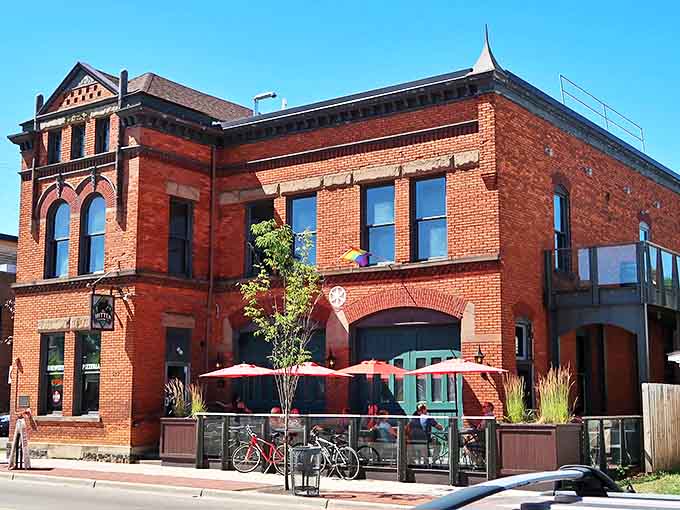 The historic brick facade of The Mitten Brewing Company stands like a monument to baseball nostalgia, inviting fans of good food and America's pastime alike.