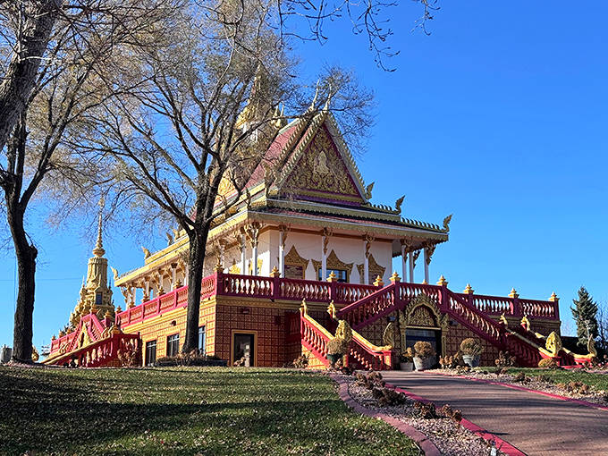 The temple's distinctive architecture creates a striking silhouette against bare winter trees, proving beauty persists through all of Minnesota's seasons.