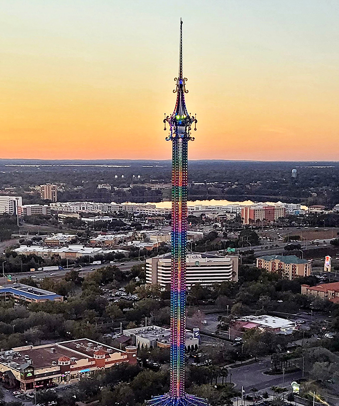 The engineering marvel stands tall against the Florida sky, its star-shaped crown ready to send thrill-seekers spinning into oblivion.