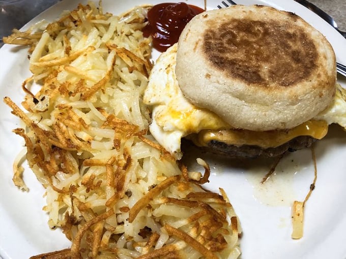 The breakfast sandwich that launched a thousand road trips &ndash; egg, cheese, and meat nestled between perfectly grilled bread with crispy hash browns standing guard.