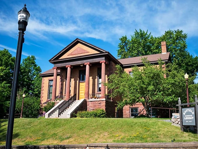 The Carnegie Library stands as Bayfield's temple of knowledge, its classical columns supporting more than just a roof&mdash;they uphold community wisdom.