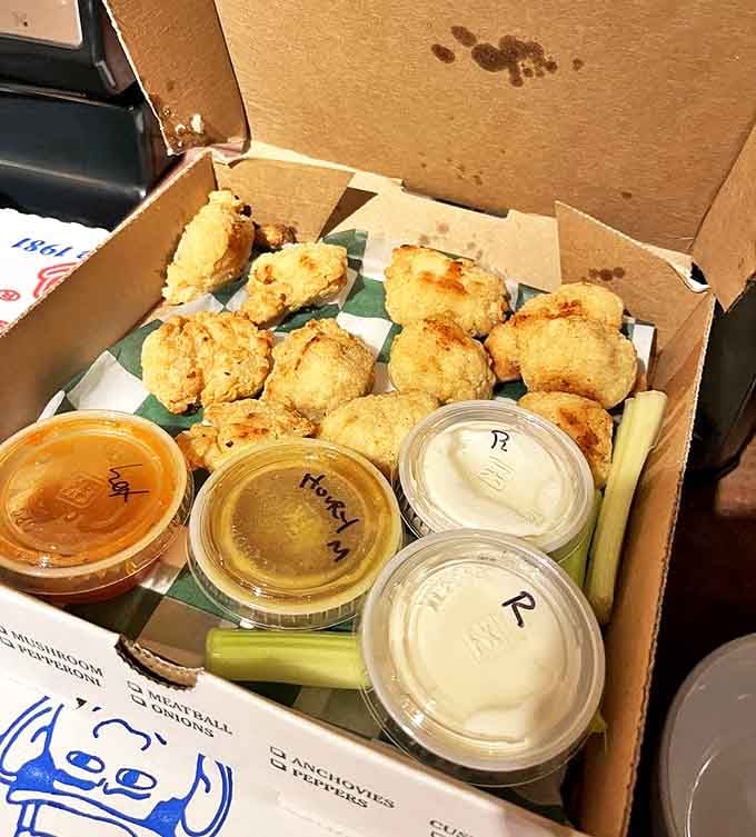 These golden-fried boneless wings with dipping sauces make a compelling opening act before the main pizza event.
