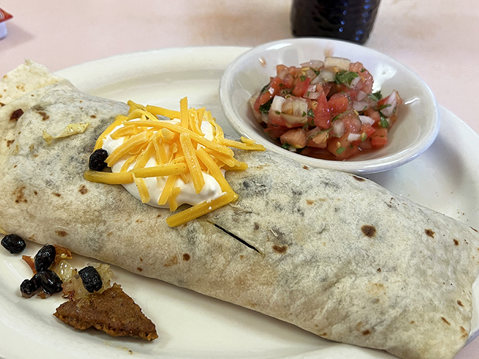 A hearty breakfast burrito stuffed with eggs, cheese and beans, served with fresh pico de gallo – diner food that satisfies without pretension.