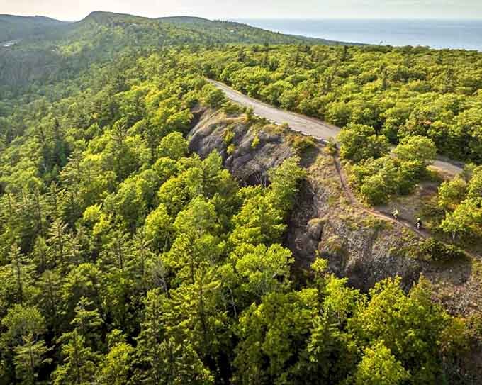 Brockway Mountain Drive: The road that makes convertible owners feel smugly vindicated, winding along clifftops with views that demand frequent photo stops.