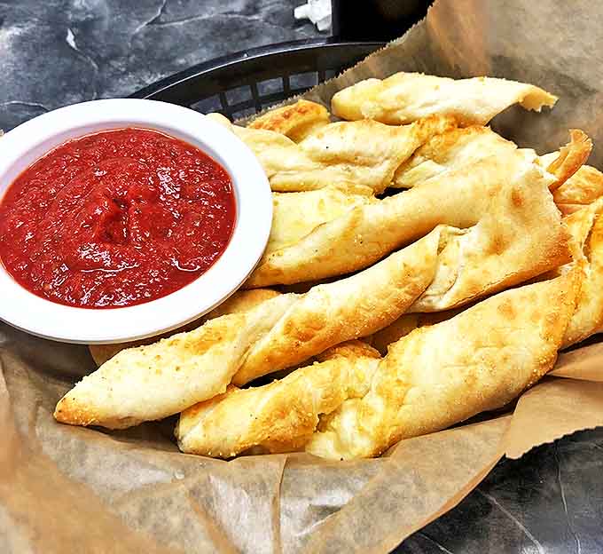 These aren't just breadsticks &ndash; they're wands of doughy magic that transform marinara sauce into an experience worth writing home about.