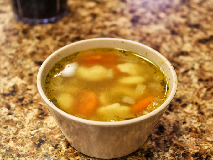 A steaming cup of homemade Chicken Dumpling Soup offers liquid comfort, especially welcome during Wisconsin's famously brisk winters.