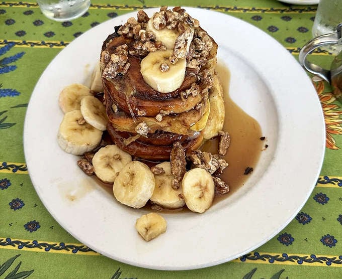 French toast tower that could make breakfast skeptics into morning people &ndash; caramelized edges giving way to custardy centers studded with bananas.