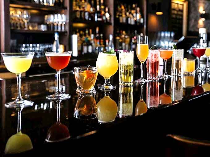 Cocktails: A rainbow of possibilities lines the bar &ndash; each glass a different adventure waiting to happen, crafted with precision that borders on obsession.