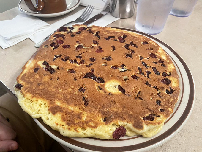 Cranberry pancakes bring a tart twist to the traditional stack &ndash; each ruby gem adding bright bursts of flavor.