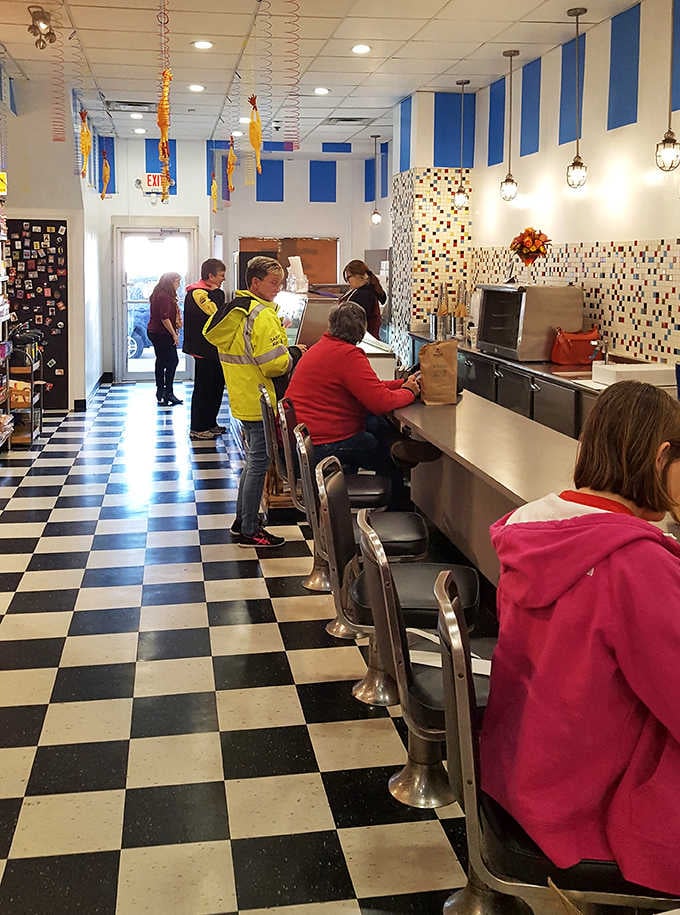 The counter seats invite patrons to slow down and savor their selections while plotting which treats to take home for later.
