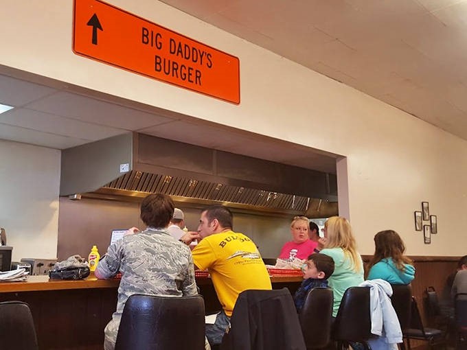 The narrow dining room buzzes with conversation and laughter as diners bond over their shared love of exceptional burgers.