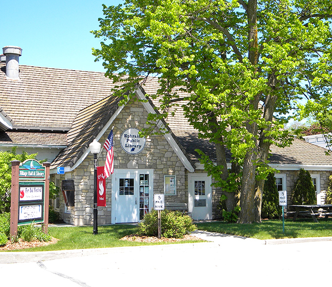 The Door County Library's Ephraim branch invites bookworms into its cozy stone cottage for literary escapes on rainy afternoons.