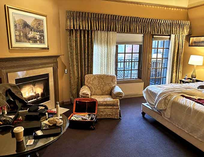 A cozy reading nook with plush seating invites guests to linger on the fireside with a good book and better wine.