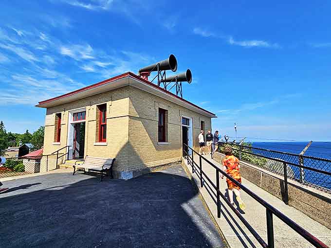 The Fog Signal Building might look unassuming, but it once bellowed warnings that saved countless sailors from Lake Superior's notorious temper.