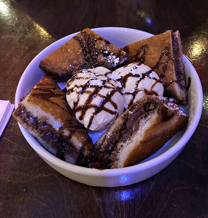 A decadent dessert of fried Nutella sandwich with ice cream – proof that sometimes the best traditions are the ones we're still creating.