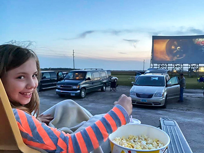 The true drive-in experience: blankets, popcorn, and that look of wonder that only comes from watching movies beneath an endless sky.
