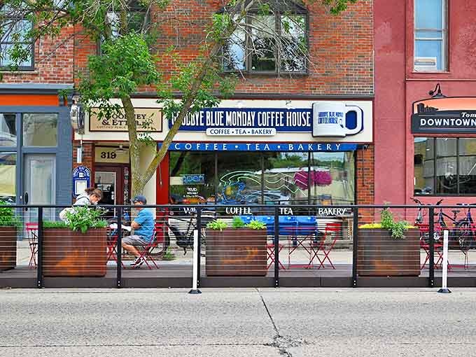 Goodbye Blue Monday Coffee House offers sidewalk seating where locals linger over expertly roasted brews, watching Division Street's daily parade.