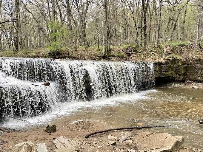 Layers of water tumble over ancient rock formations, creating a scene so picturesque it almost seems unfair to other waterfalls trying to compete.