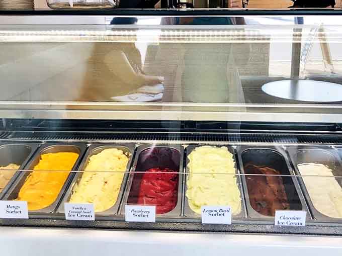 Summer refreshment in frozen form – vibrant sorbets and creamy ice creams waiting to cool you down after that warm croissant indulgence.