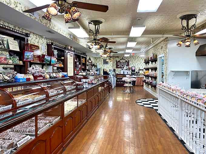 Walking these polished wooden floors feels like entering a cathedral of confection, where sugar is the religion and everyone's a devoted believer.
