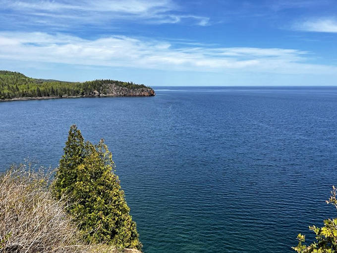 Lake Superior stretches to the horizon, containing enough water to make every other lake feel slightly inadequate.