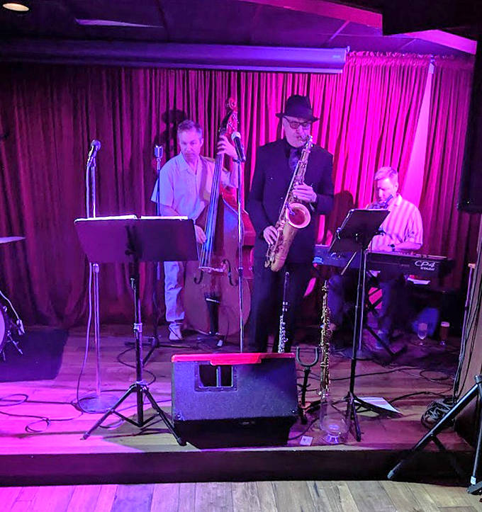The jazz trio transforms the speakeasy with soulful notes &ndash; where saxophone melodies bounce off century-old stone walls.