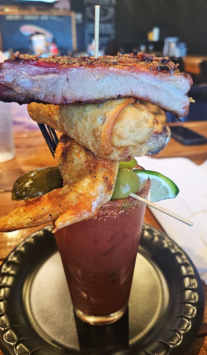 Loaded Bloody Mary: Part beverage, part architectural achievement &ndash; this garnish-topped masterpiece with a rib perched on top is practically a meal itself.