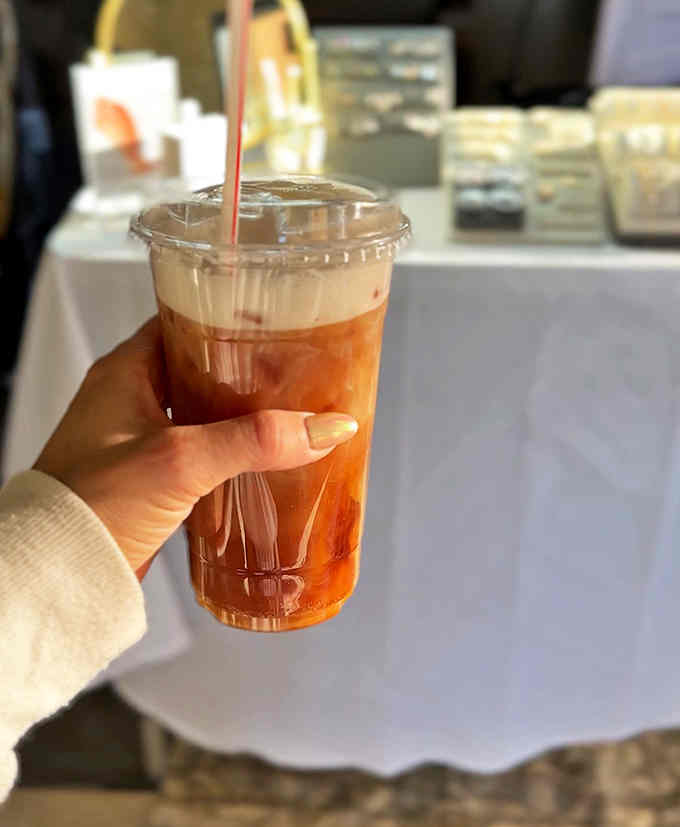 Iced coffee with beautiful layers of cream and espresso that's almost too photogenic to drink, but you'll manage somehow.