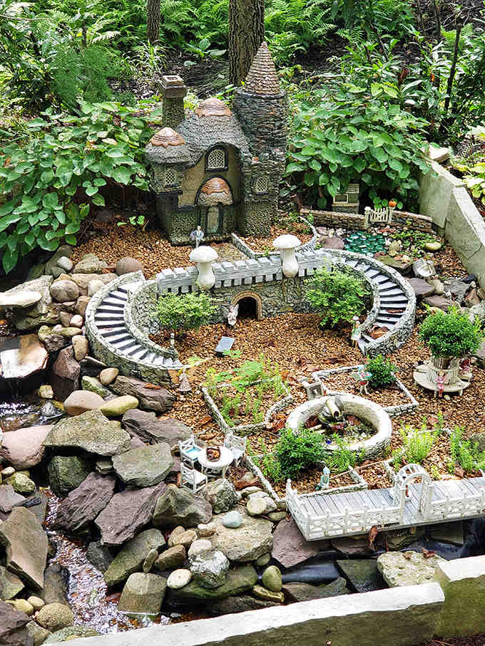 A world within a world &ndash; this meticulously crafted miniature garden invites visitors to kneel down and discover a tiny universe of wonder.