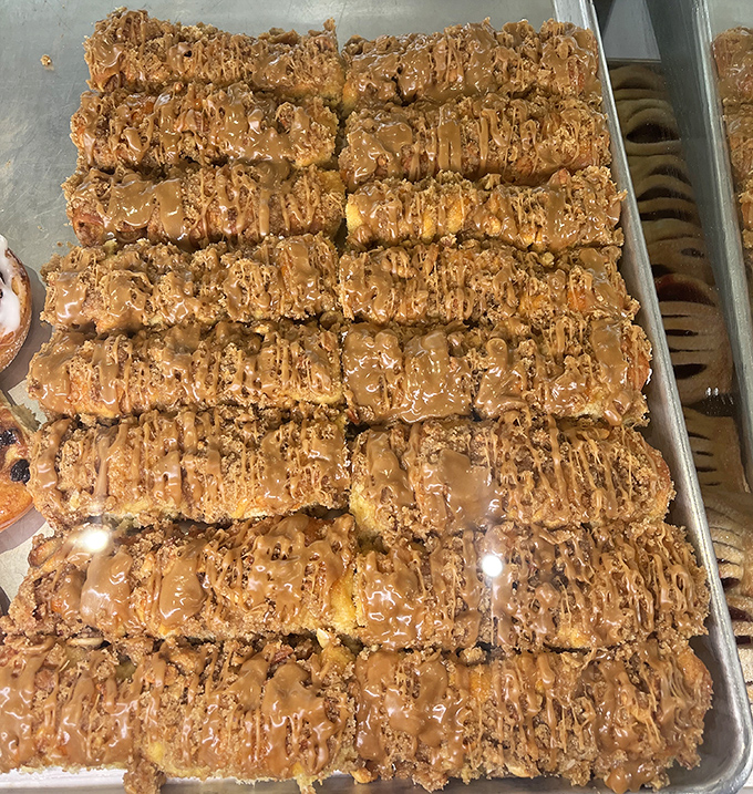 These caramel-drizzled nut stollens aren't just pastries &ndash; they're edible architecture, with layers of flavor that tell stories of generations of baking expertise.