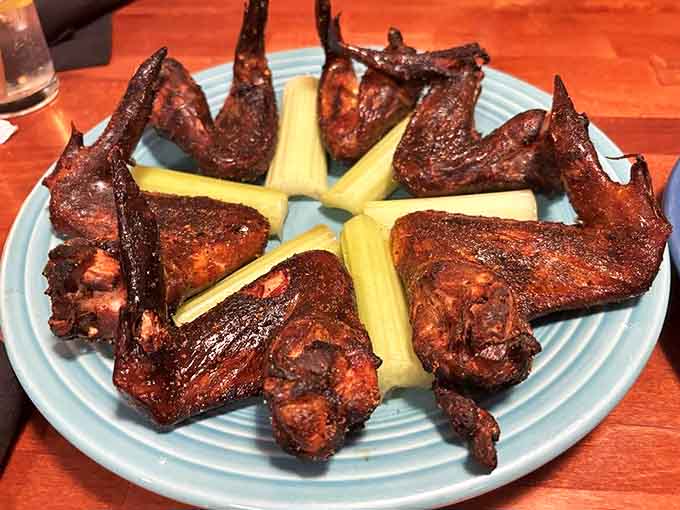 These aren't just wings &ndash; they're smoked, flavor-packed flavor bombs arranged like a delicious sunburst around celery spears.