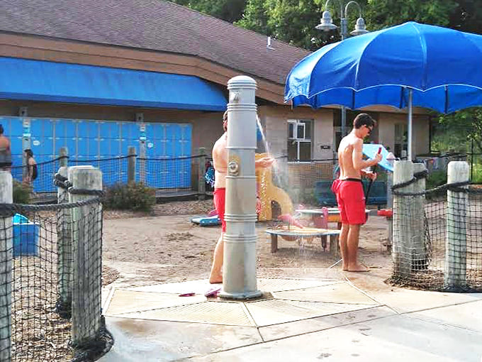 Outdoor shower stations &ndash; where kids reluctantly rinse off while plotting their next underwater handstand competition.