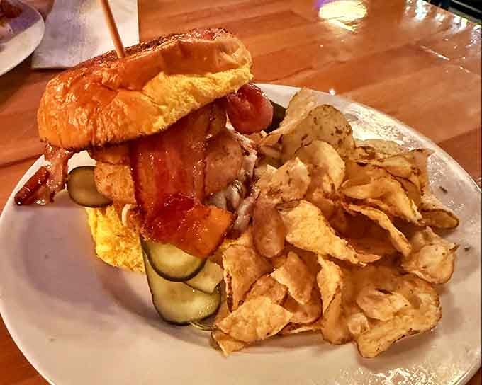 The Paisley chicken sandwich arrives like edible architecture &ndash; stacked high with crispy pickles and accompanied by house-made chips that disappear mysteriously fast.